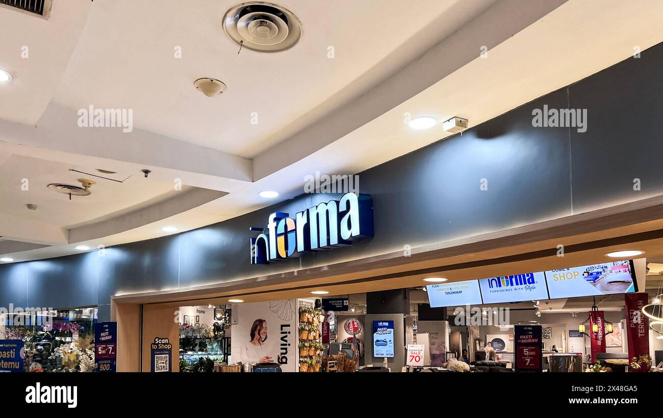 Informa brand retail shop logo signboard on the storefront in the ...