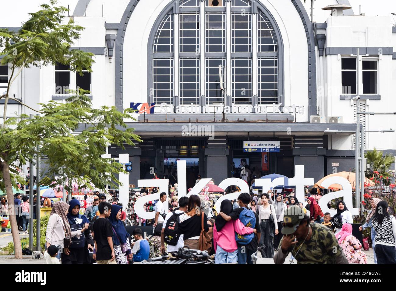 Heavy traffic including a decorated horse cart, stuck in traffic jam in ...