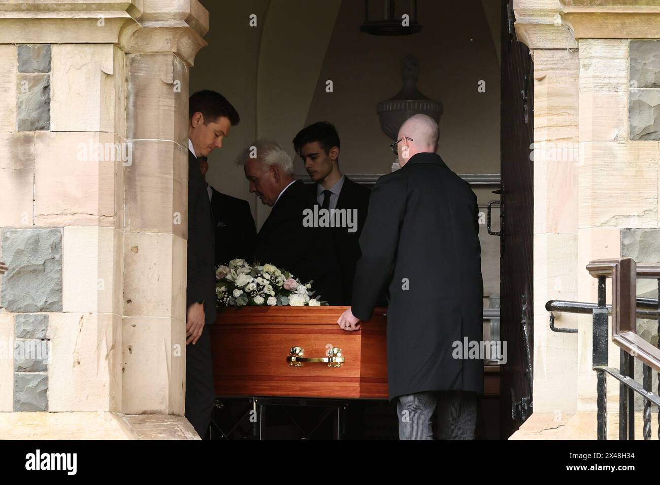 The coffin of former BBC Northern Ireland political editor and director ...