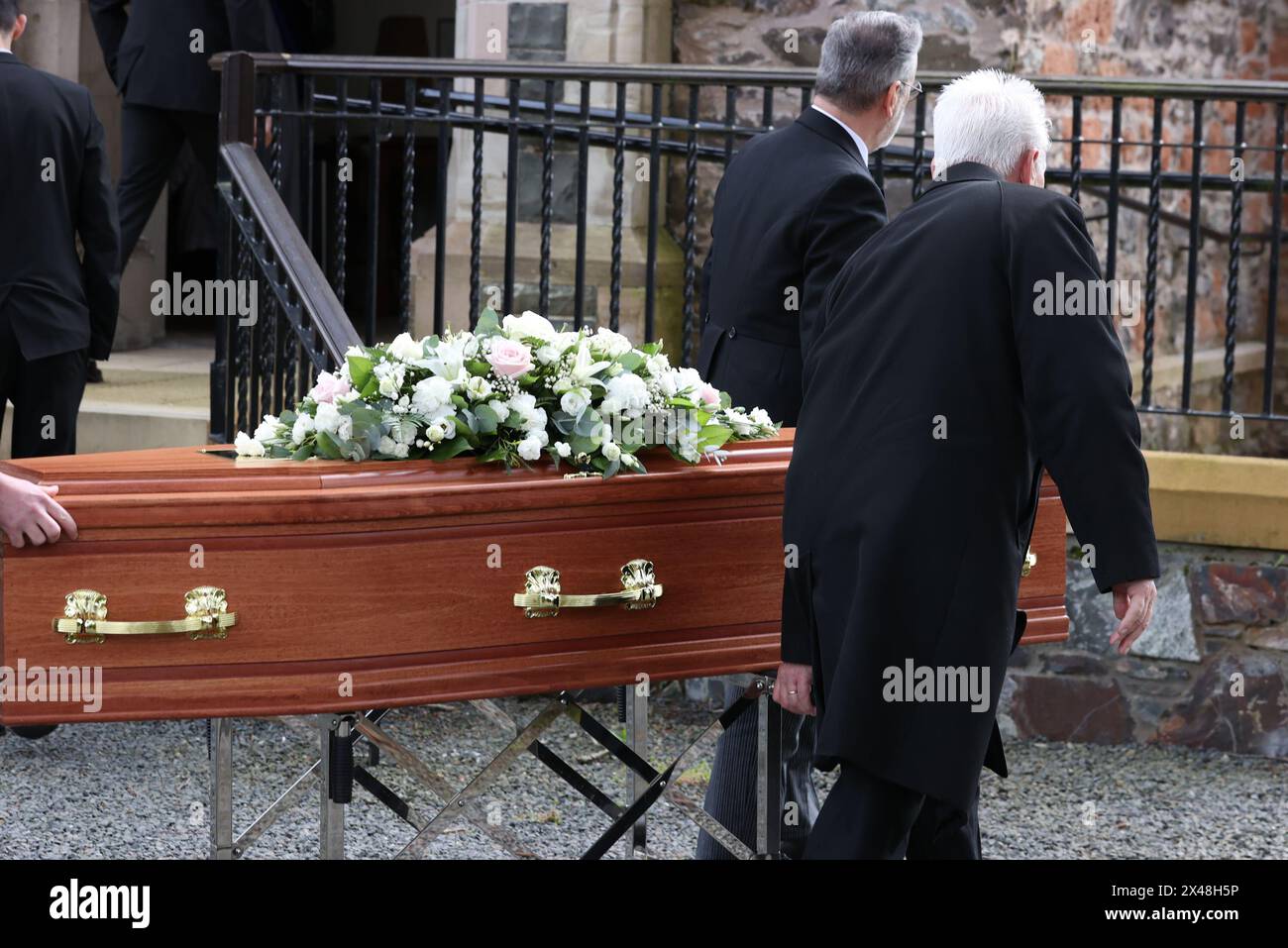 The coffin of former BBC Northern Ireland political editor and director ...