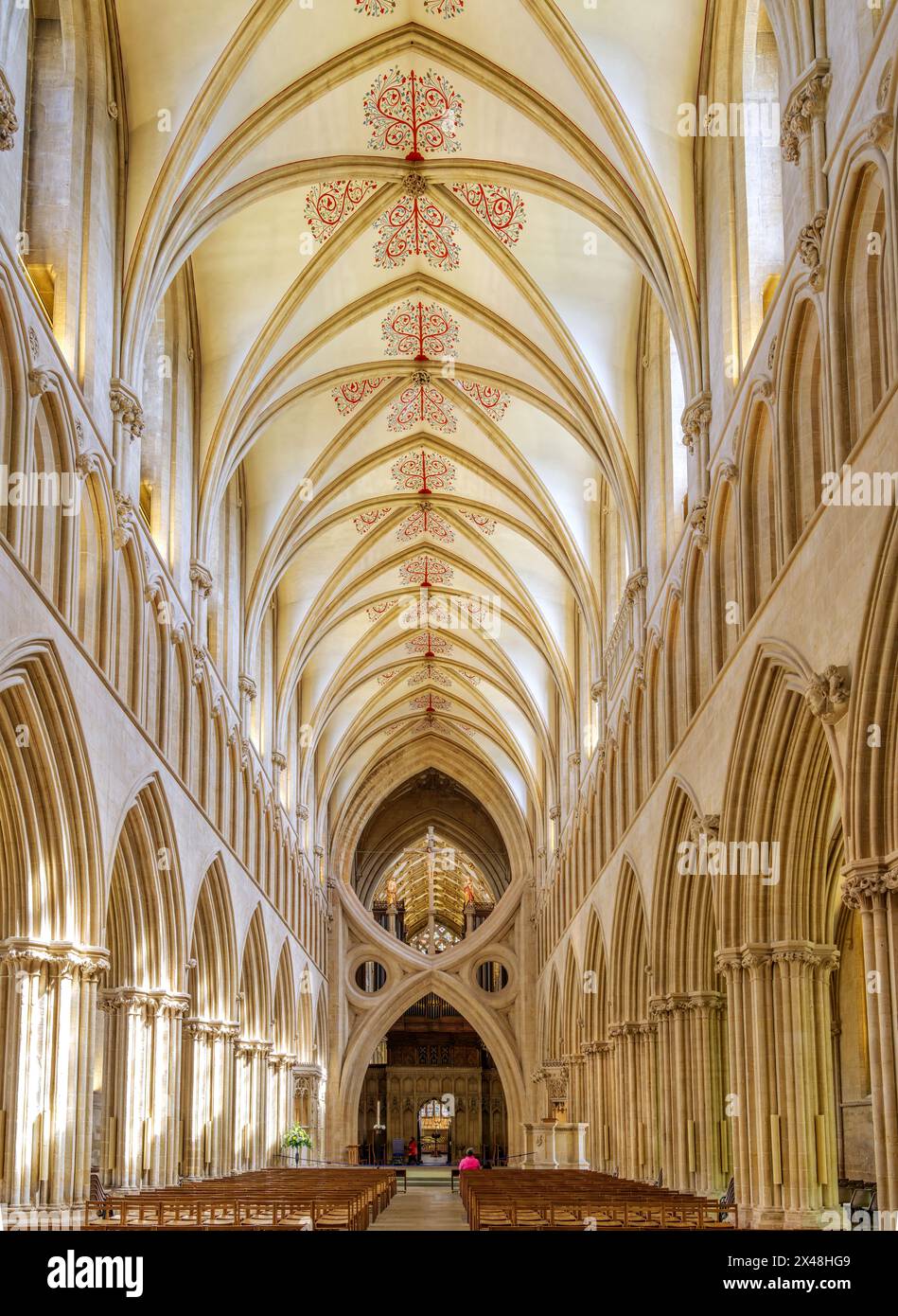 Gothic nave of Wells Cathedral in Somerset looking towartds the scissor ...