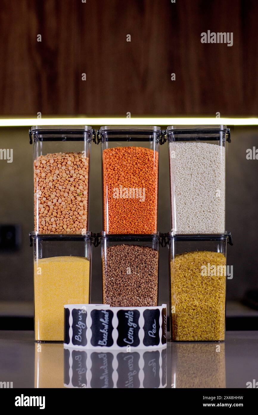 Kitchen storage organization use plastic case. Placing and sorting food ...