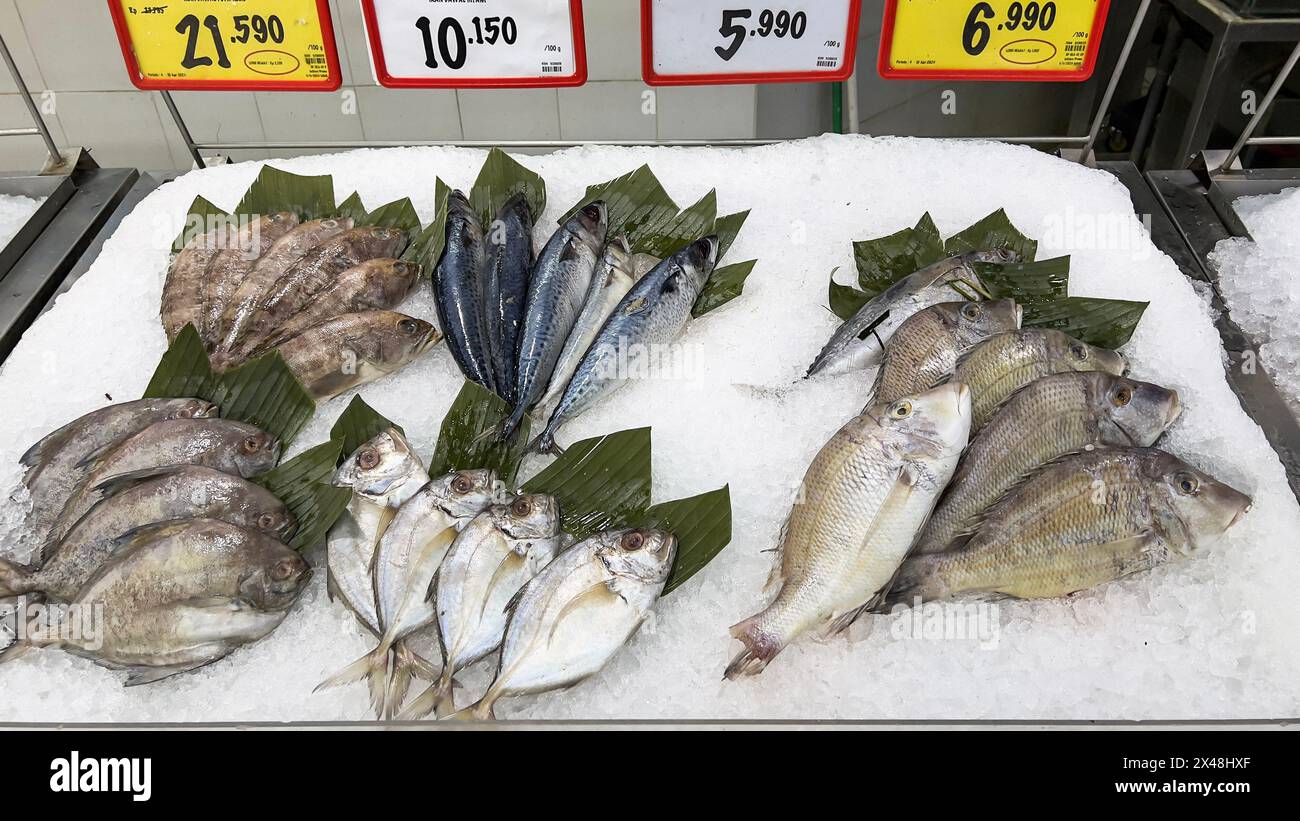 A selection of different fishes at the seafood section of the ...