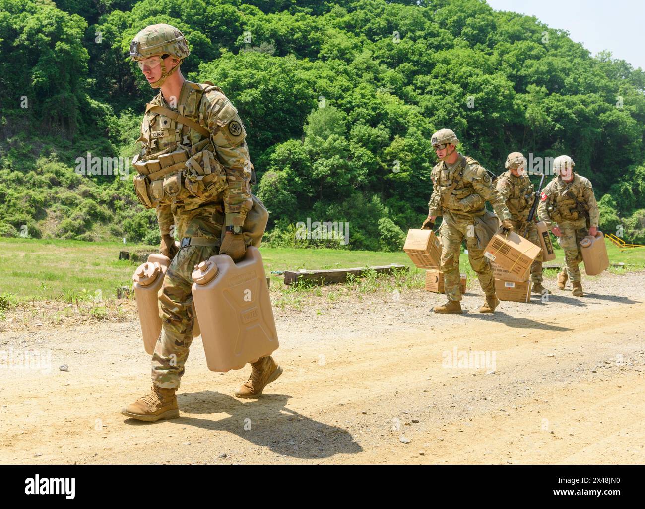 Dongducheon, South Korea. 01st May, 2024. US soldiers carry water ...