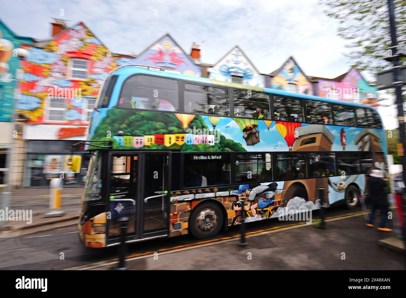 A bus going through Bedminster, Bristol sprayed with artwork to promote ...