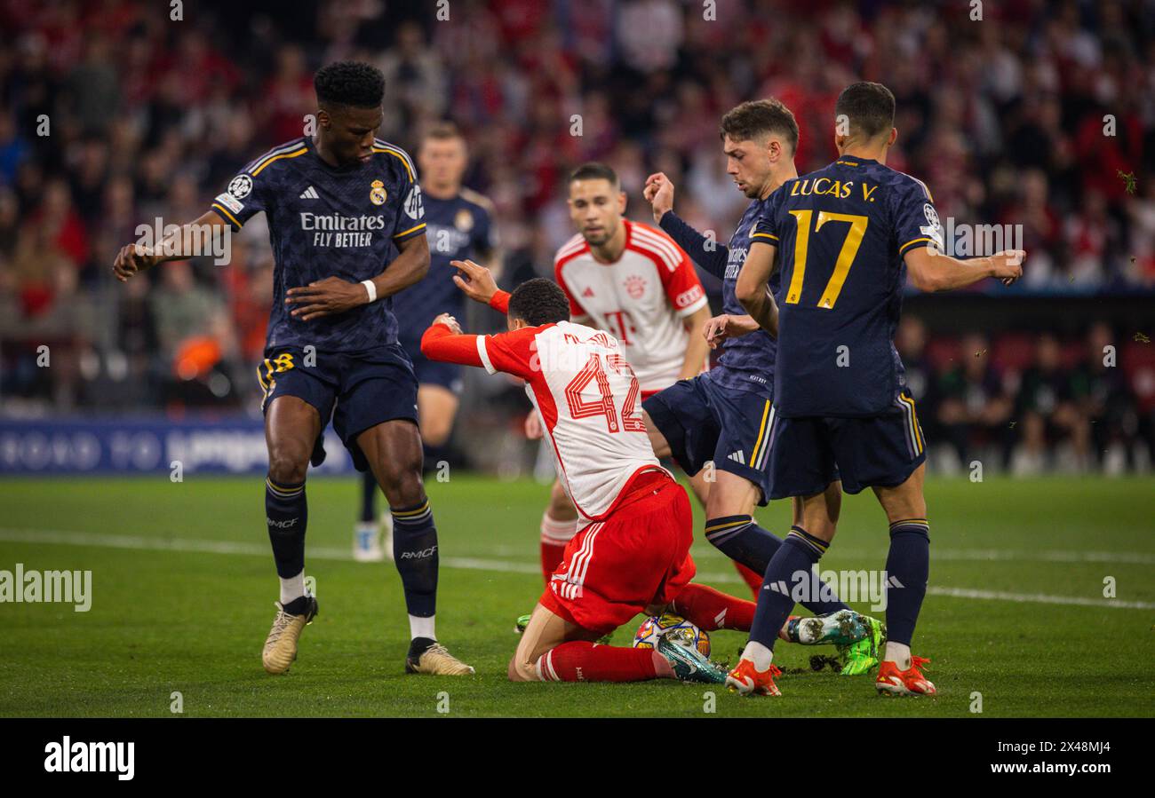 Munich, Germany. 30th Apr 2024. Jamal Musiala (Muenchen) holt Elfmeter ...