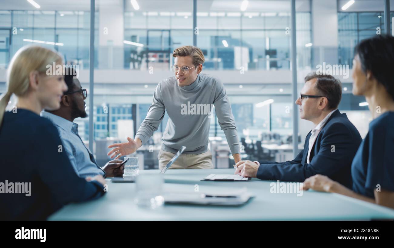 Modern Office Meeting Room: Handsome Executive Director Stands in the ...