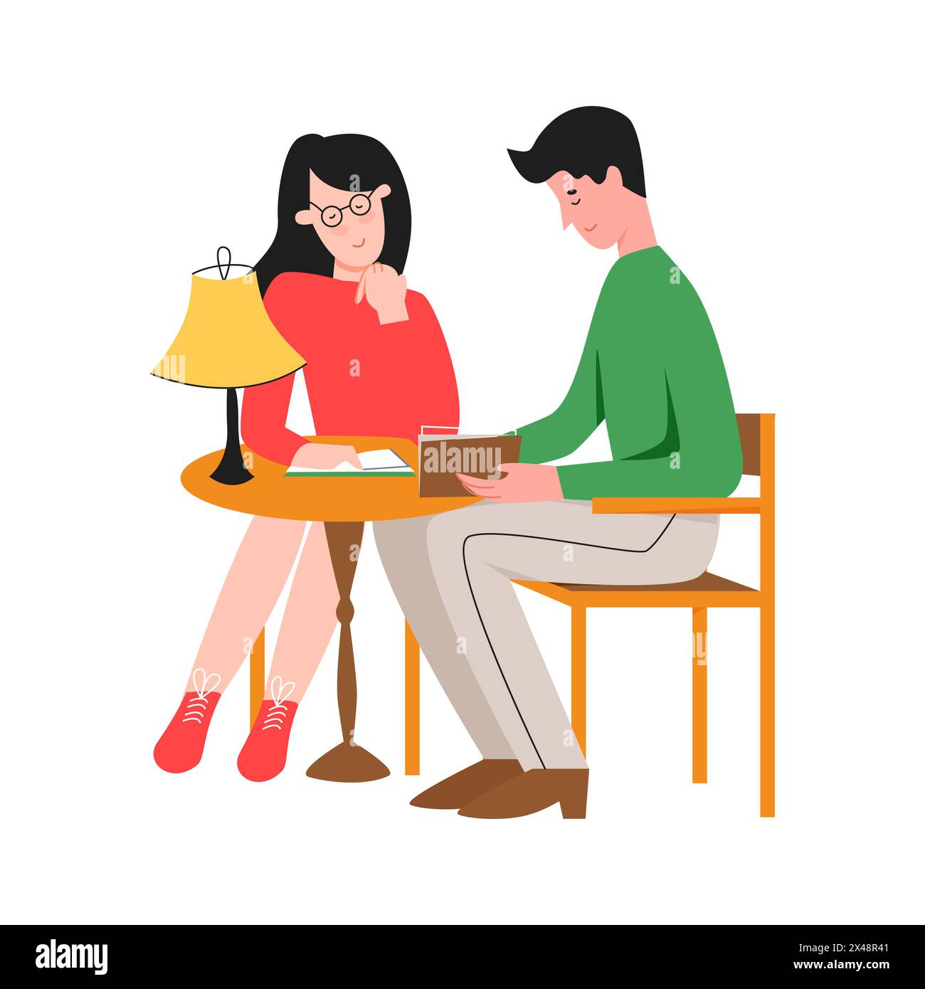 Couple of students sitting at table to study together, guy and girl ...