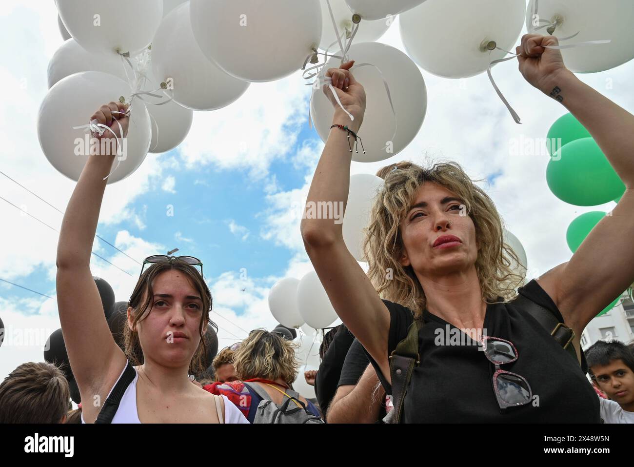 May Day Rally Protesters hold balloons in front of the Greek Parliament ...
