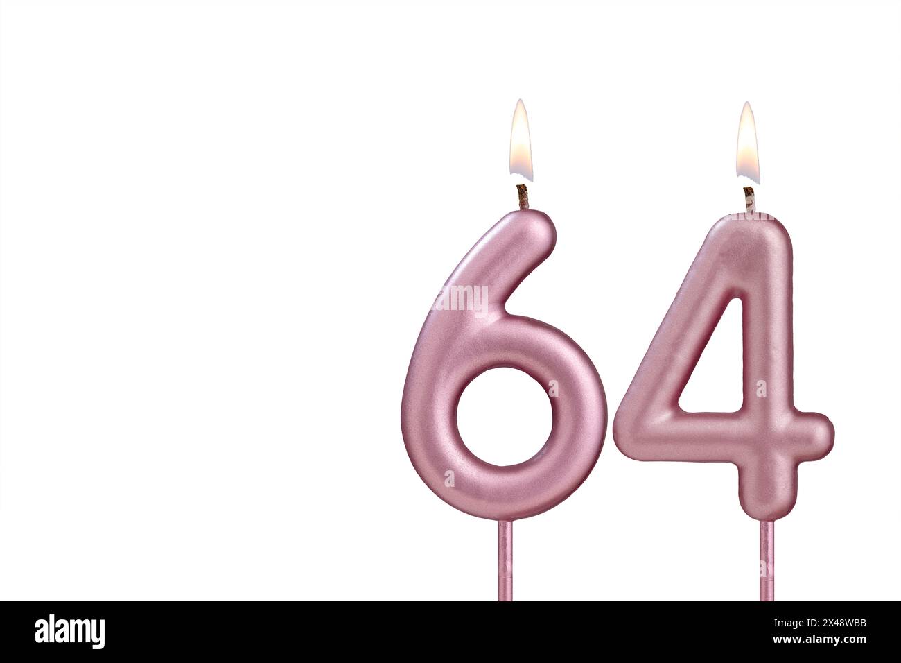 Lit birthday candle - Candle number 64 on white background Stock Photo ...