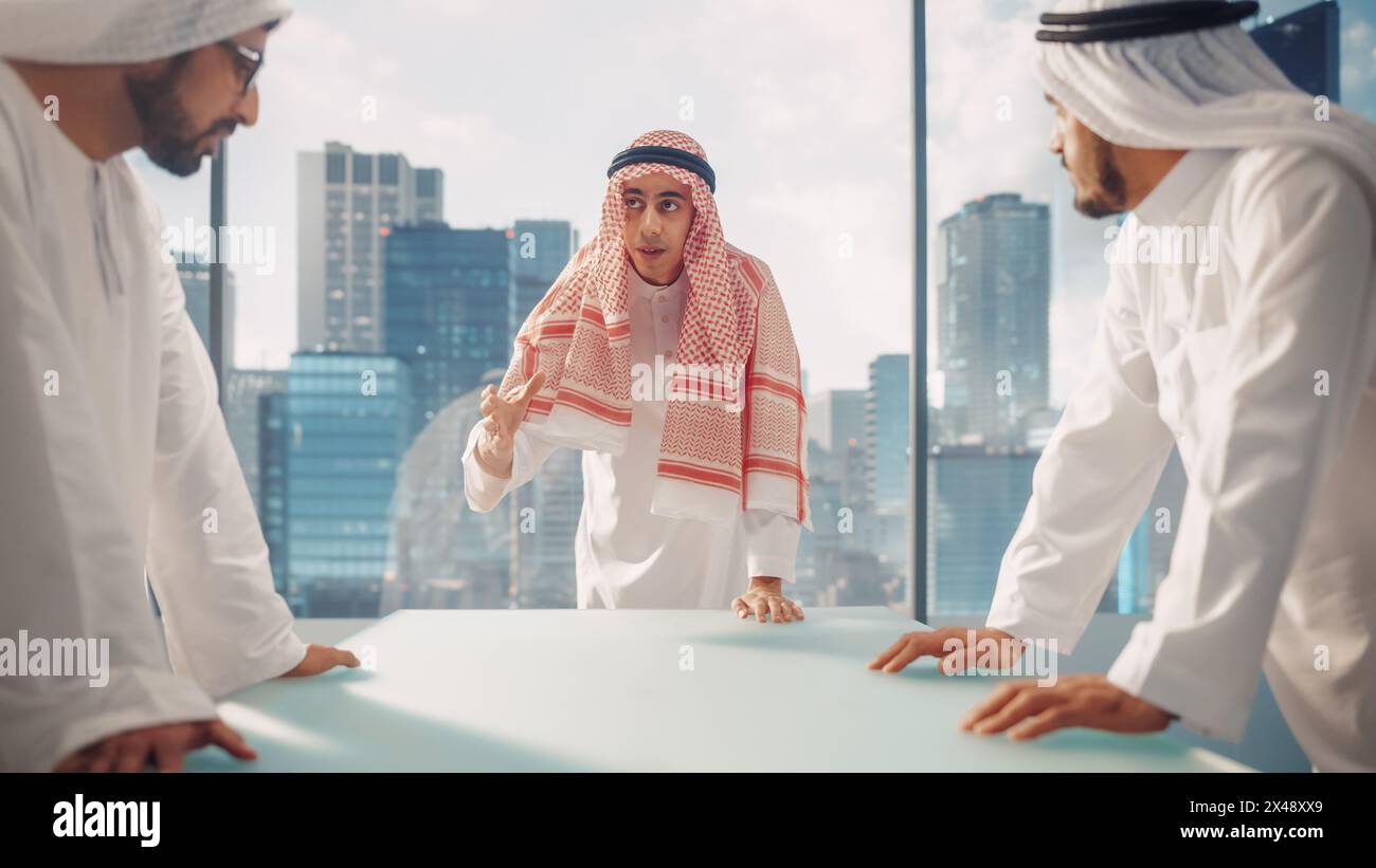 Three Successful Emirati Businessmen in White Traditional Kandura in ...