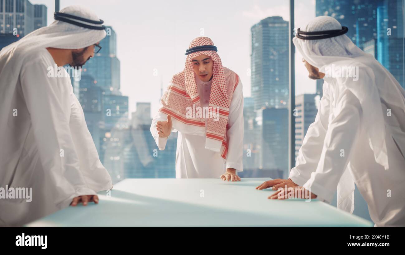 Three Successful Emirati Businessmen in White Traditional Kandura in ...