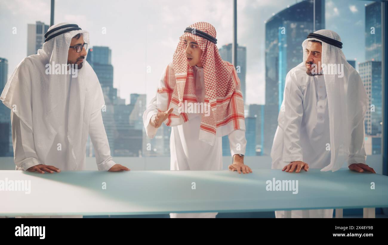 Three Successful Emirati Businessmen in White Traditional Kandura in ...