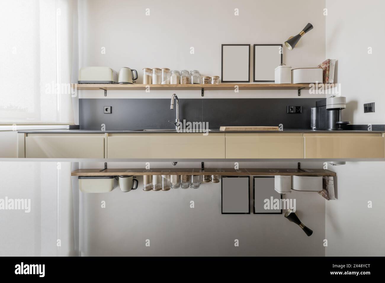 A front of a kitchen with shelves full of condiments and their ...