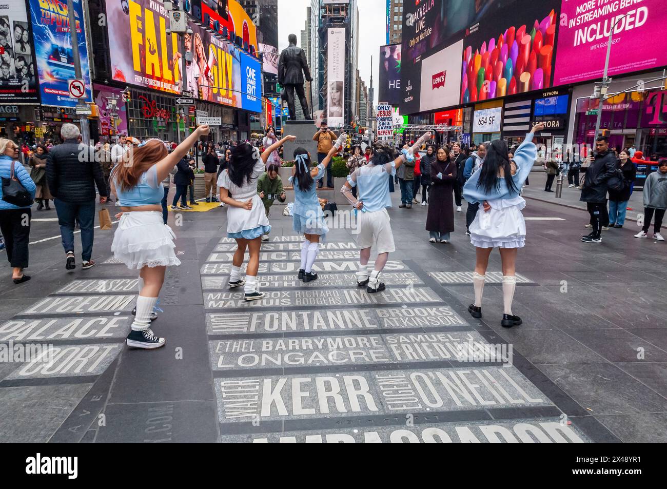 Dancers film a video in Times Square in New York on Sunday, April 21 ...