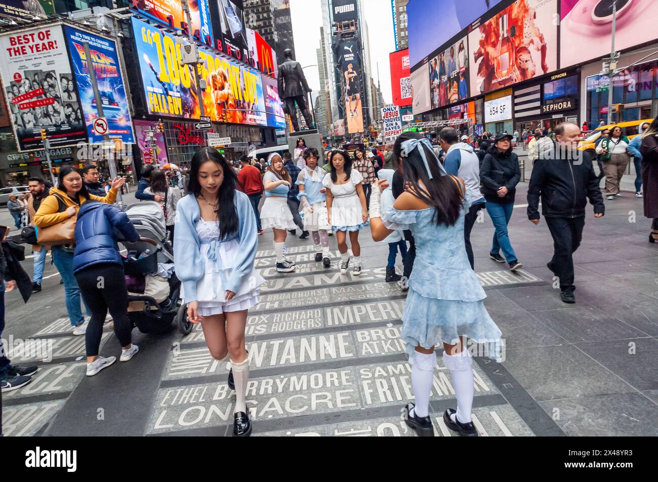 Dancers film a video in Times Square in New York on Sunday, April 21 ...