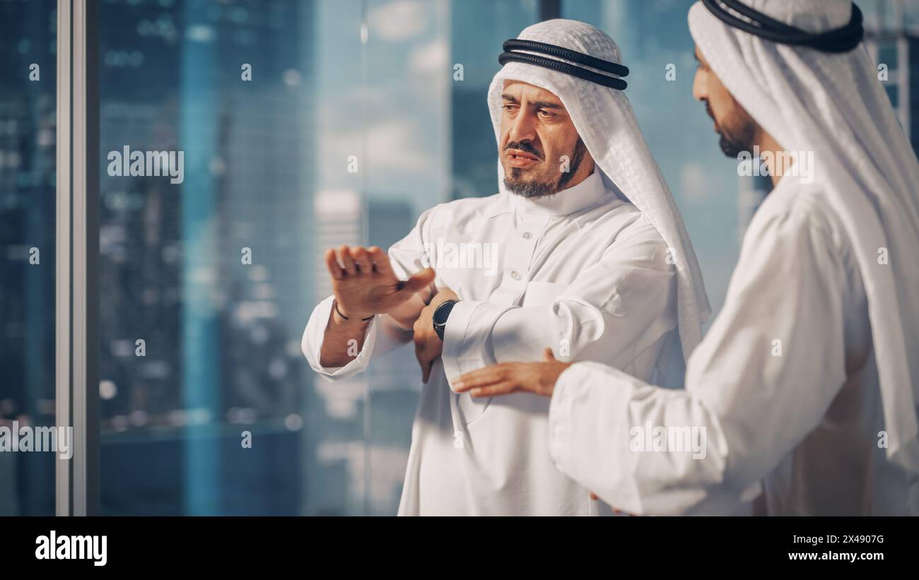 Two Successful Muslim Businessmen in White Traditional Outfit Standing ...