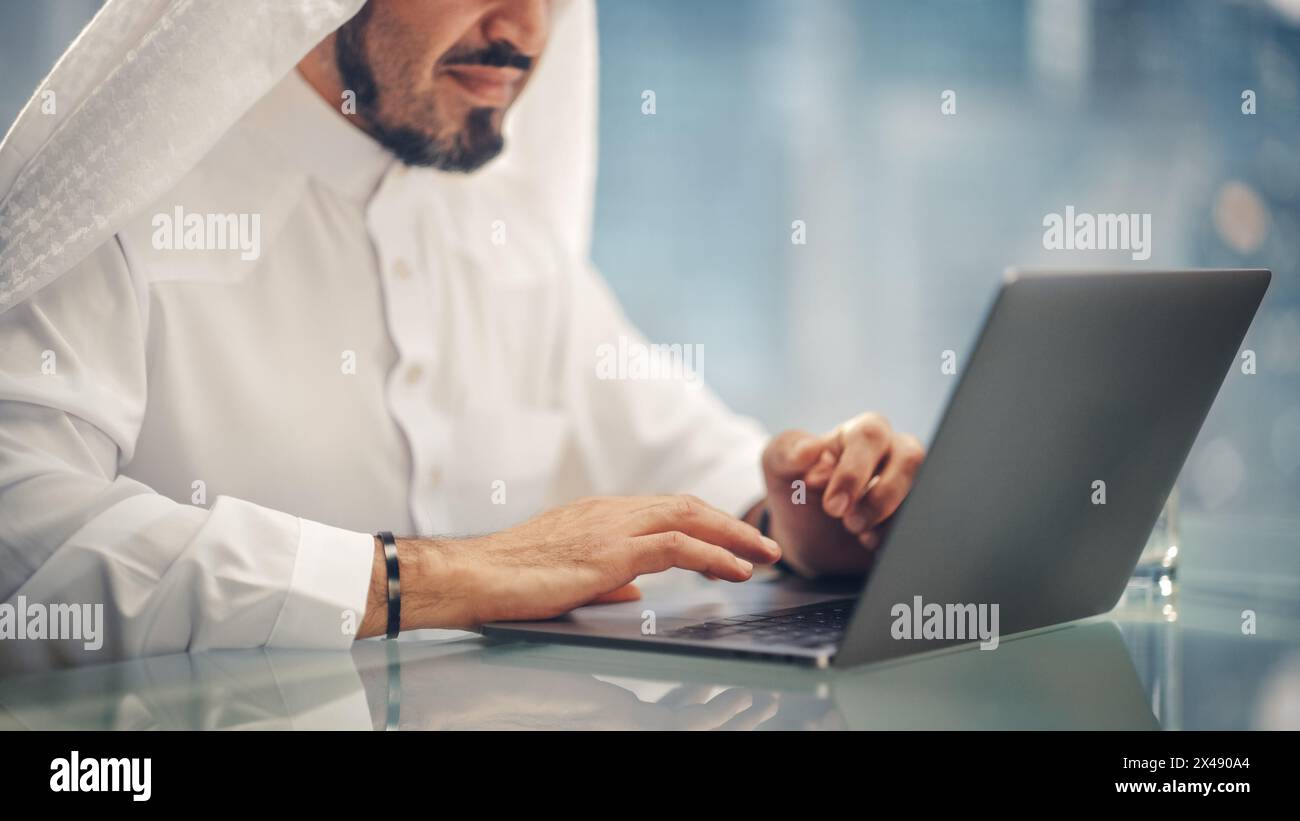 Successful Arab Businessman in White Traditional Outfit Sitting in ...