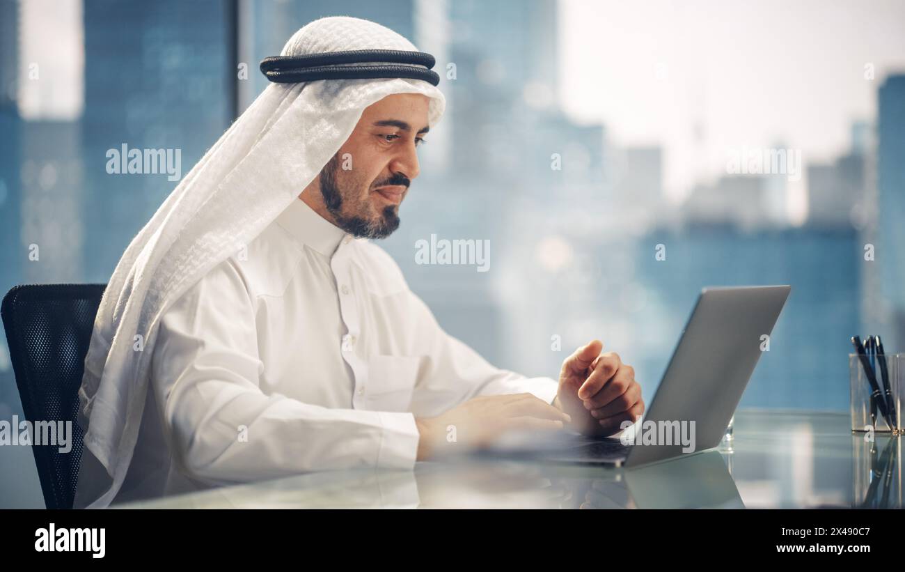 Arab Businessman in White Traditional Outfit Sitting in Office and ...