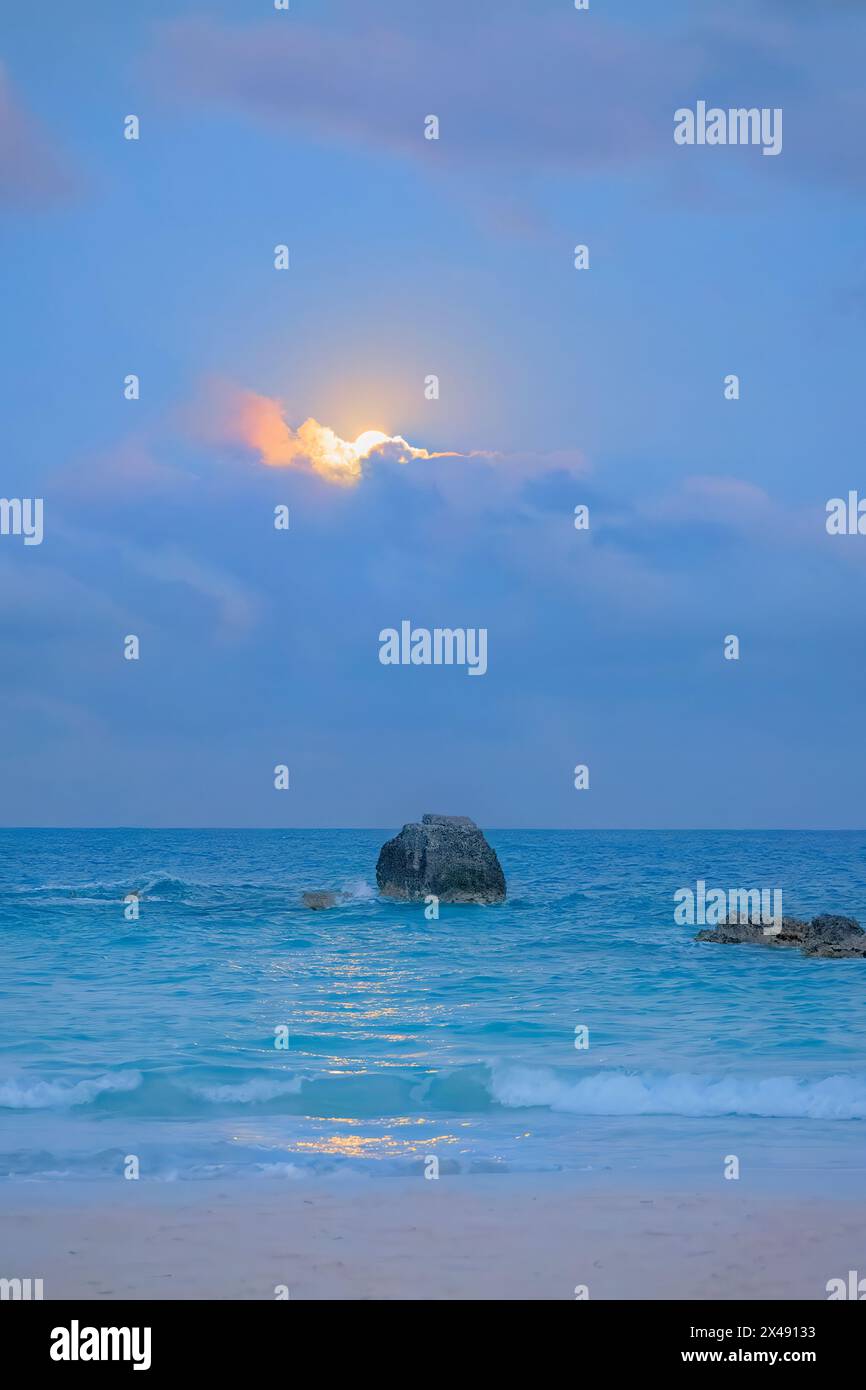 Glowing Pink Moon Rising Over Pink Bermuda Sand Stock Photo - Alamy