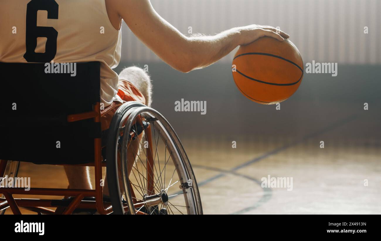 Wheelchair Basketball Game: Professional Players Competing, Dribbling ...