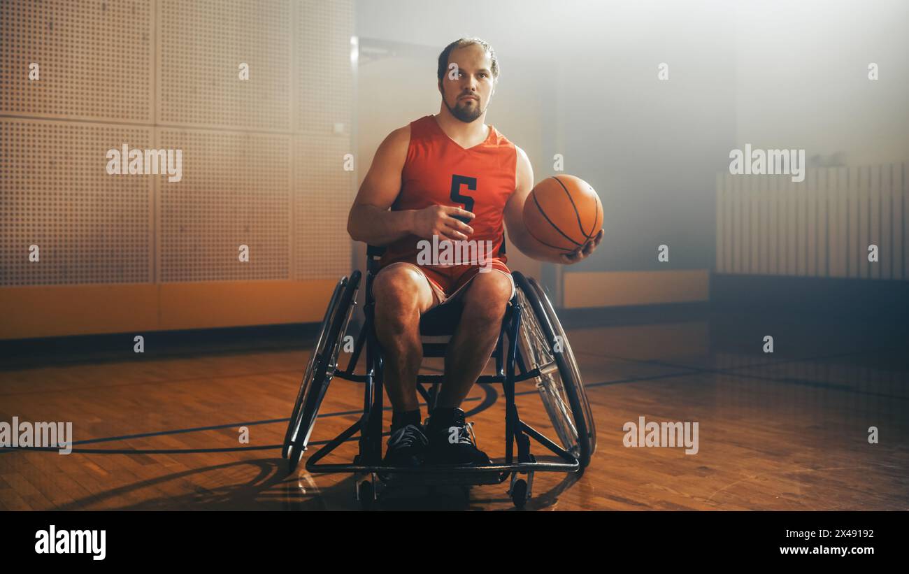 Portrait wheelchair basketball player dribbling hi-res stock ...