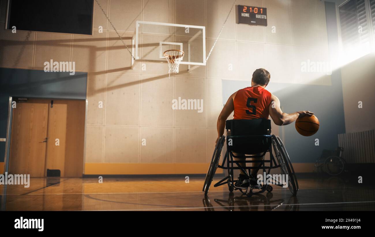 Wheelchair Basketball Player Wearing Red Shirt Dribbling Ball Like a ...