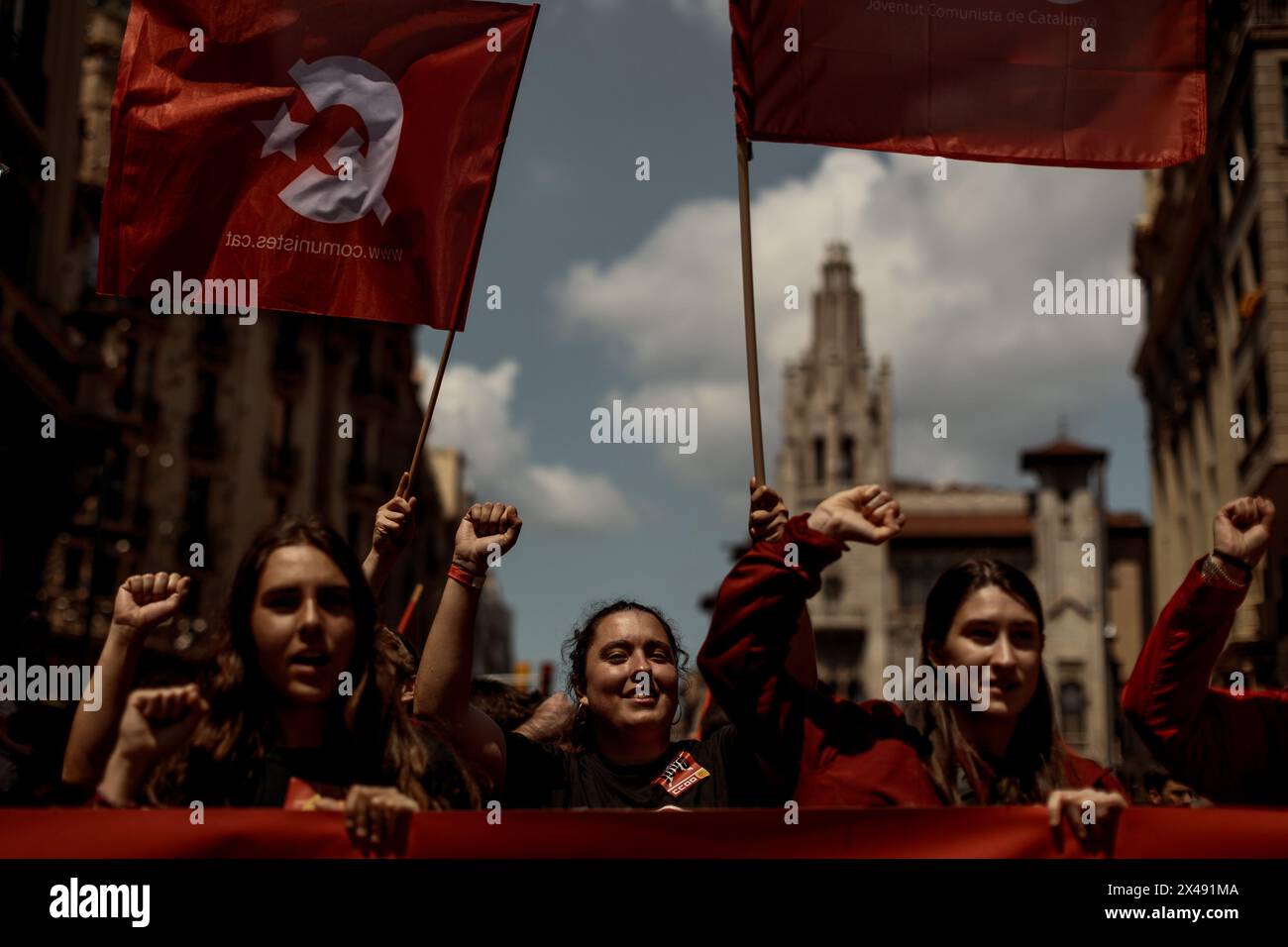 Barcelona, Spain. 1st May, 2024. Communists demonstrate for the working ...
