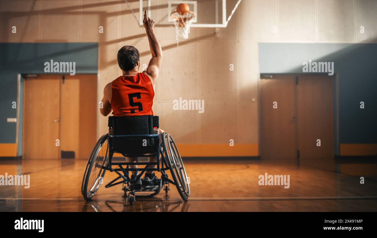 Wheelchair basketball player dribbling ball hi-res stock photography ...