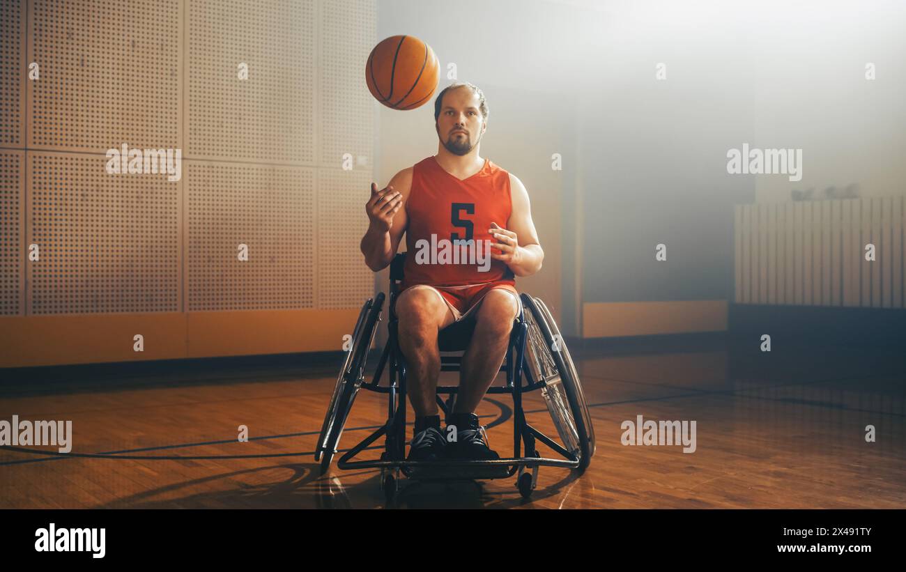 Portrait wheelchair basketball player dribbling hi-res stock ...