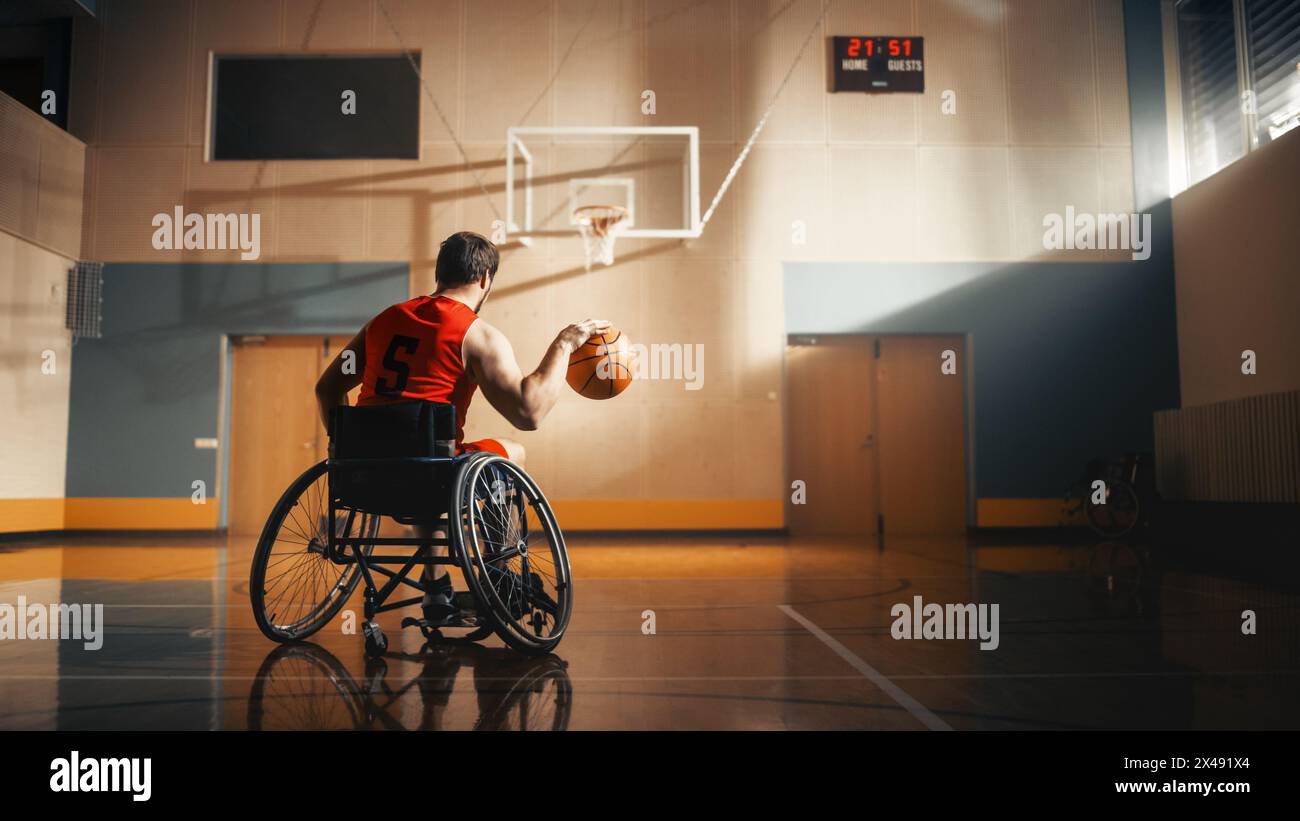 Wheelchair basketball player dribbling ball hi-res stock photography ...
