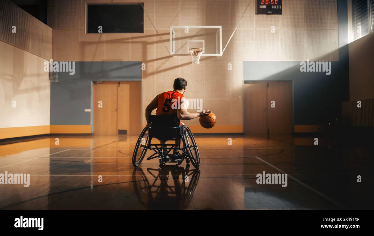 Wheelchair basketball player dribbling ball hi-res stock photography ...