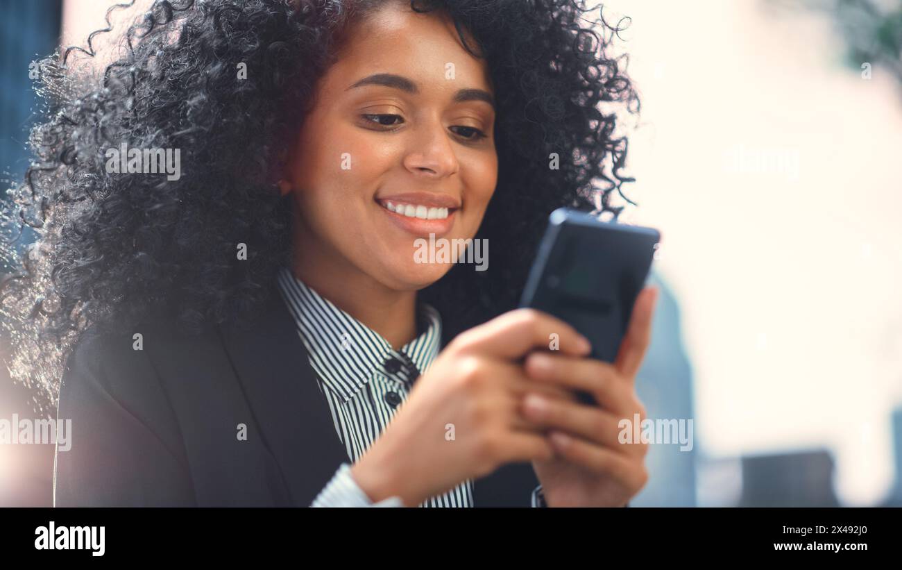 Beautiful Black Woman Using Smartphone, Typing Email Message, Browsing ...
