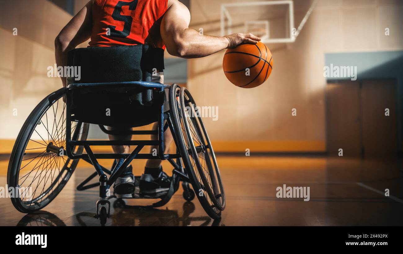 Wheelchair basketball player dribbling ball hi-res stock photography ...