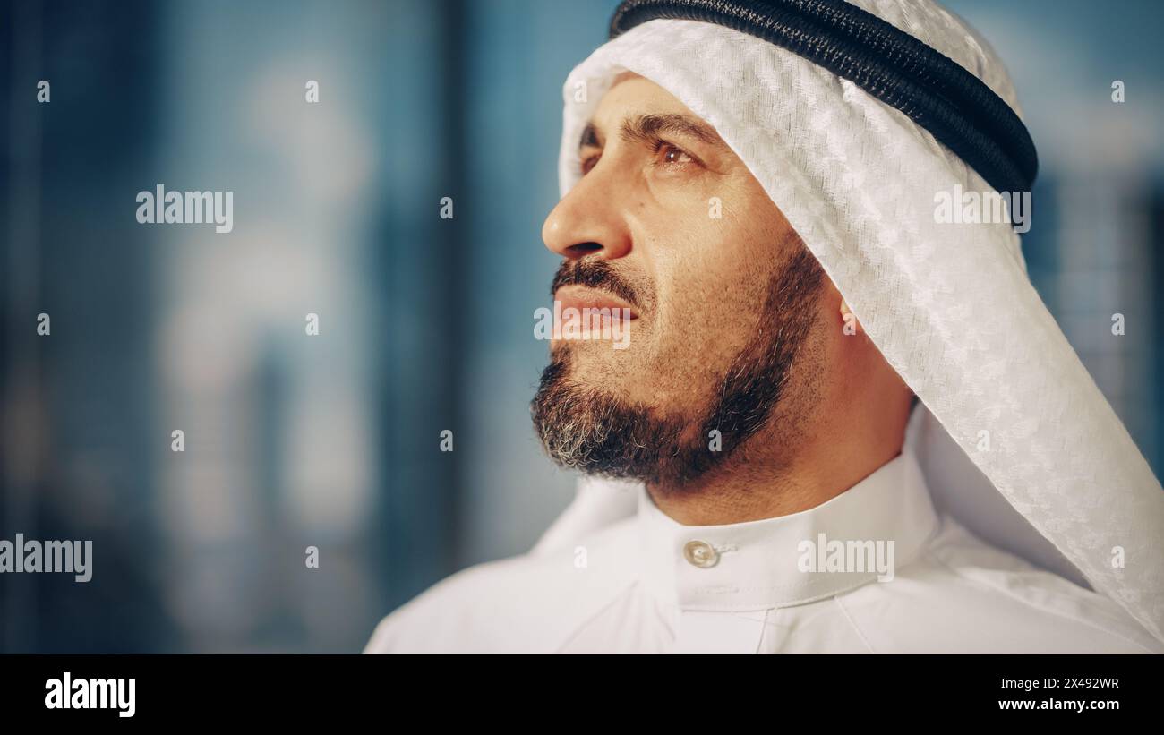 Portrait of Successful Muslim Businessman in Traditional Outfit Gently ...