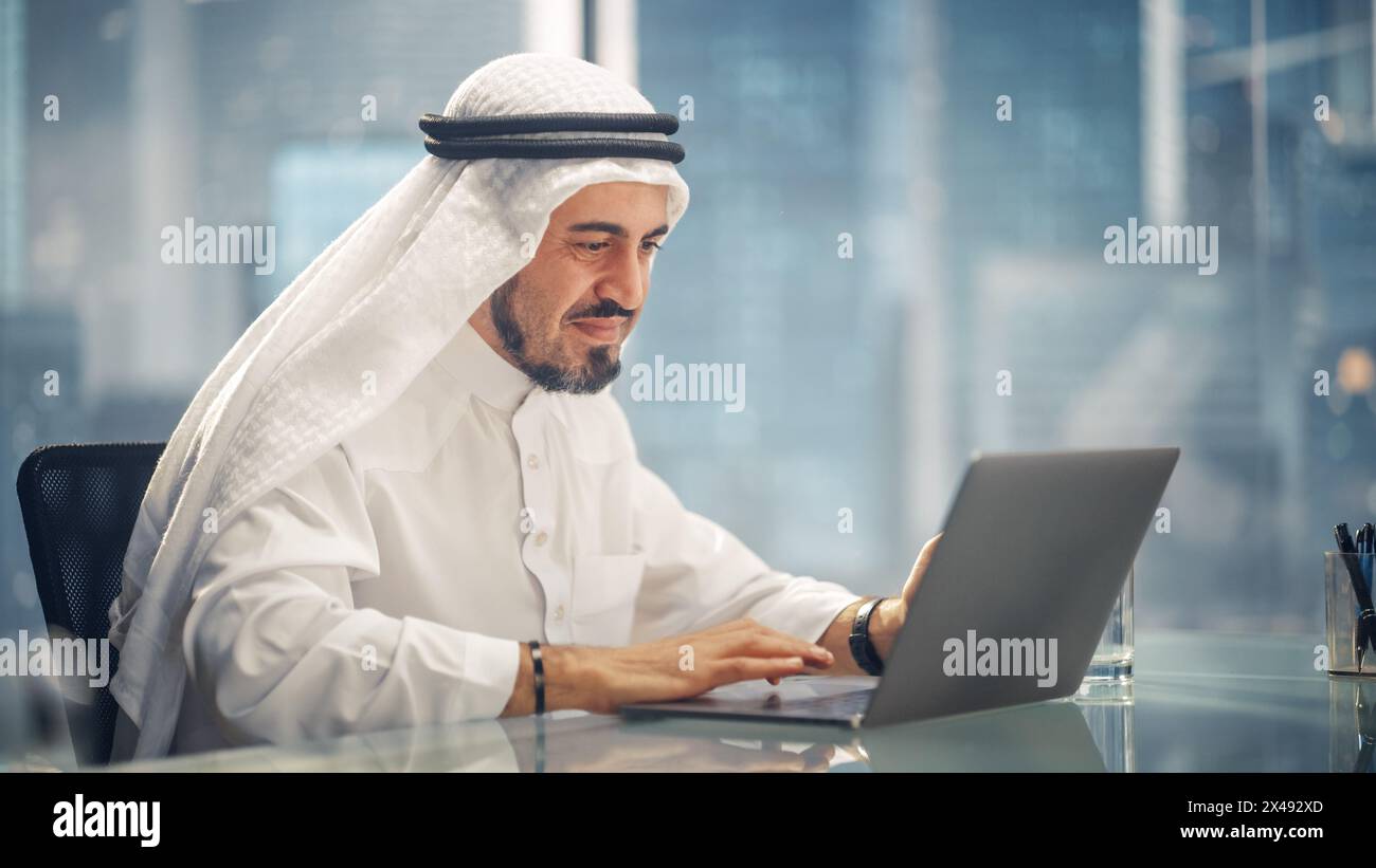 Arab Businessman in White Traditional Outfit Sitting in Office and ...