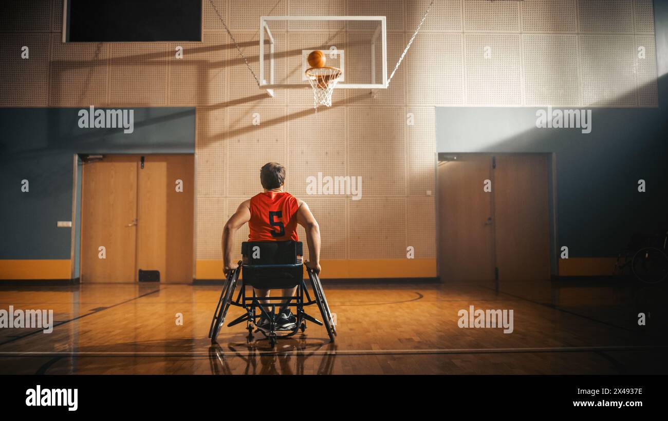 Wheelchair Basketball Player Successfully Shooting Ball, Scoring a ...