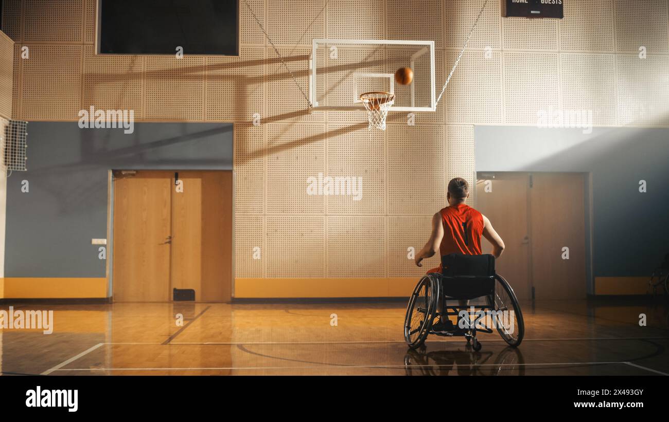 Wheelchair Basketball Player Successfully Shooting Ball, Scoring a ...