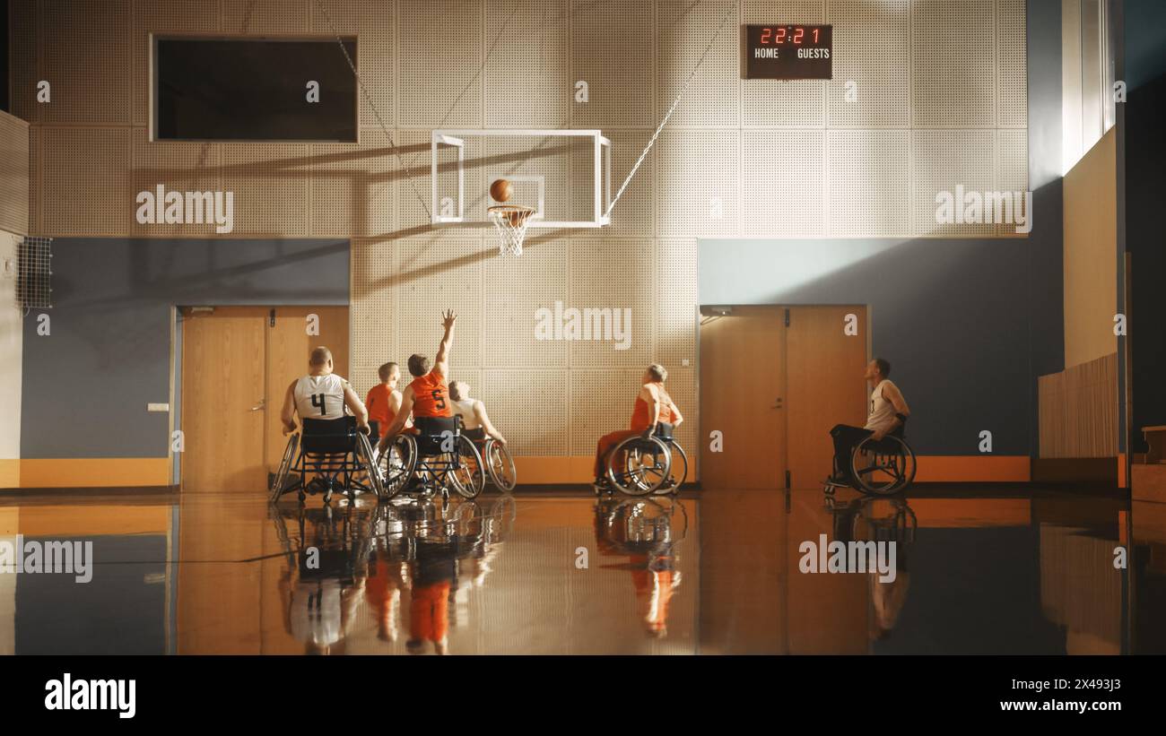 Wheelchair Basketball Game: Professional Players Competing, Dribbling ...