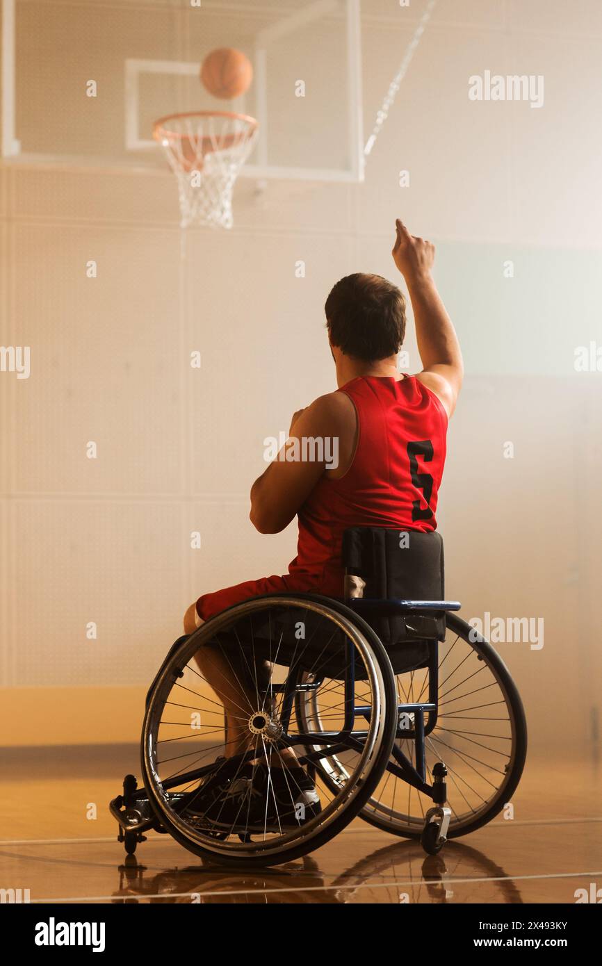 Wheelchair Basketball Play: Player Shooting Ball Successfully, Scoring ...