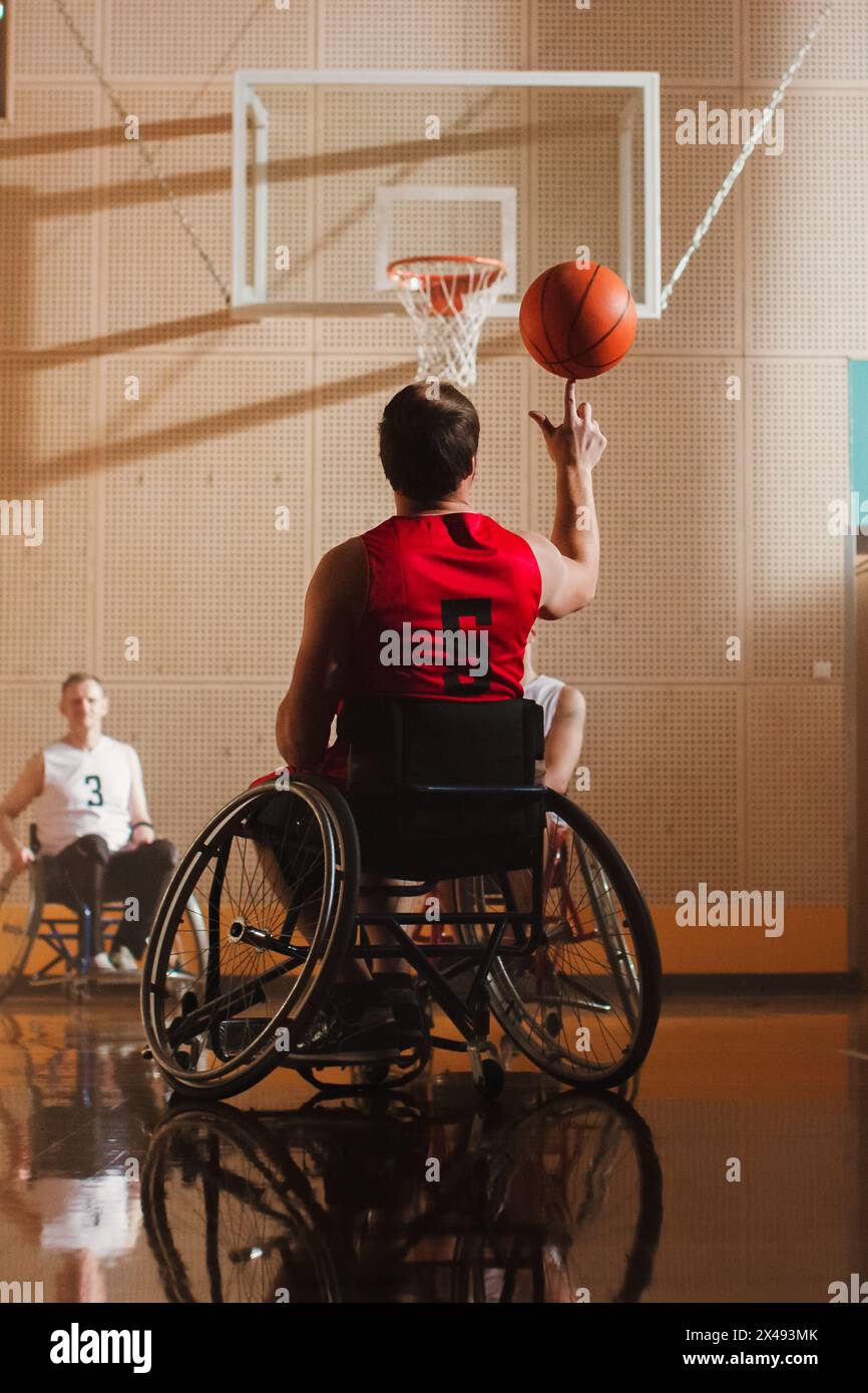 Disabled athlete spinning basketball ball hi-res stock photography and ...