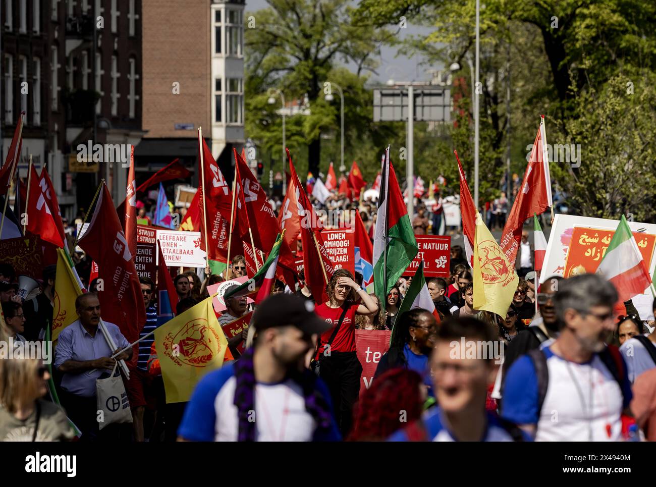 AMSTERDAM - Activists during a protest march on Labor Day. Trade union ...