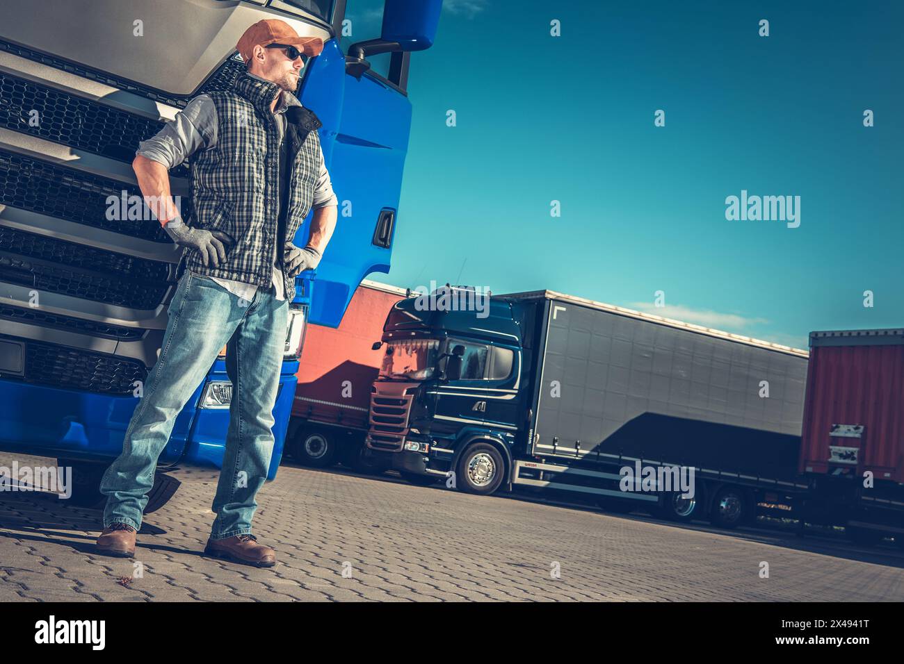 Caucasian European Semi Truck Driver Staying Next to His Blue Semi ...
