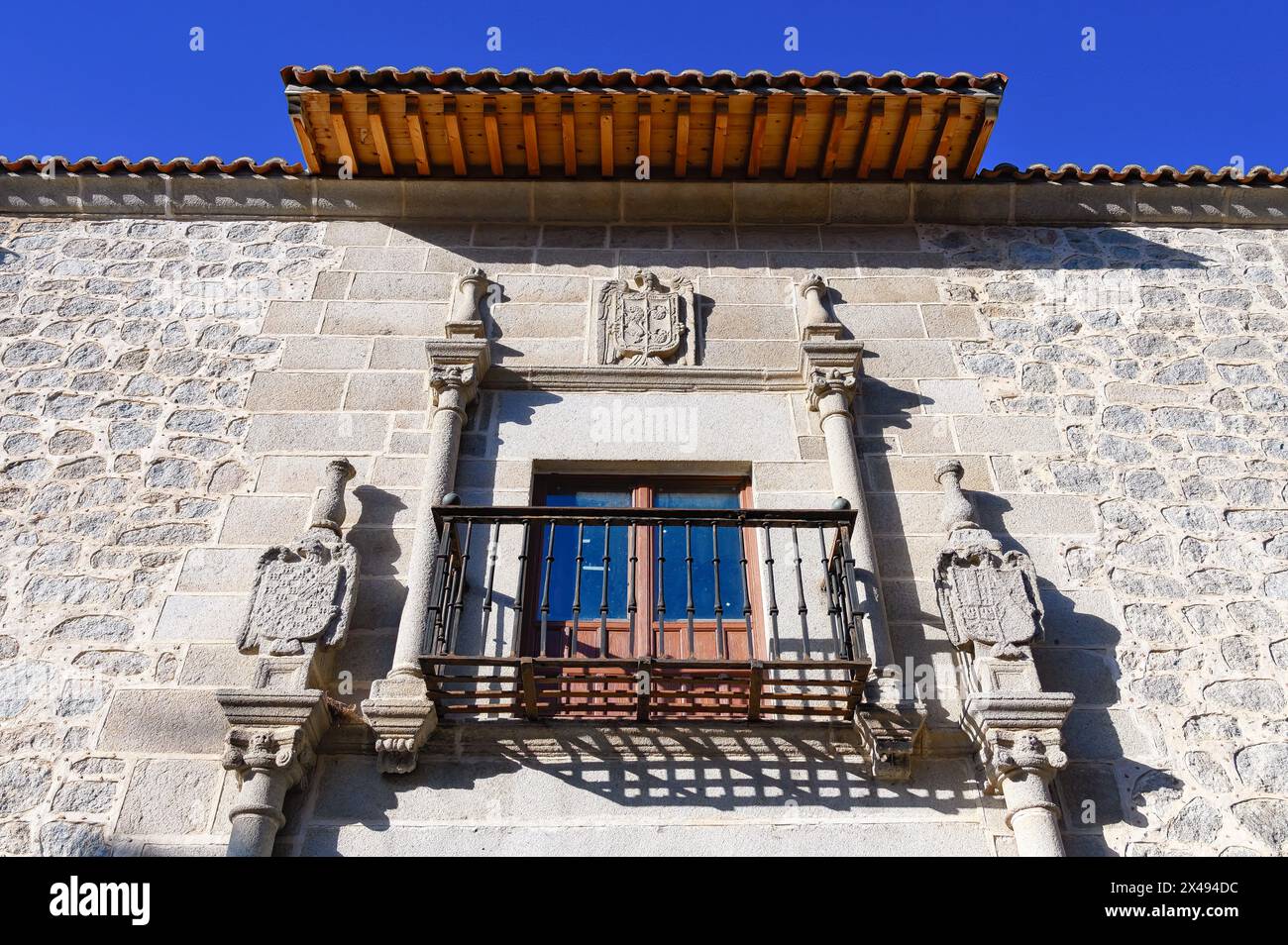 Ancient window and balcony. Medieval architecture in Palacio de los ...