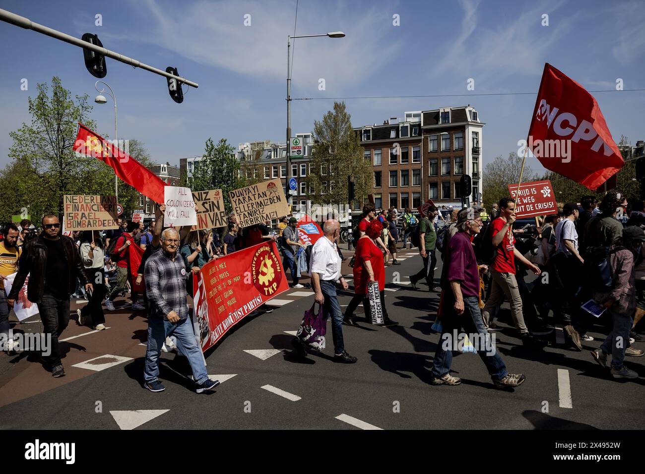 AMSTERDAM - Activists during a protest march on Labor Day. Trade union ...