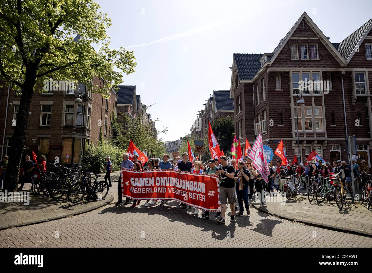 AMSTERDAM - Activists during a protest march on Labor Day. Trade union ...