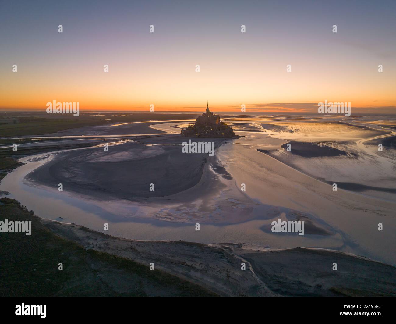 Aerial view of the famous French landmark Abbaye du Mont-Saint-Michel ...