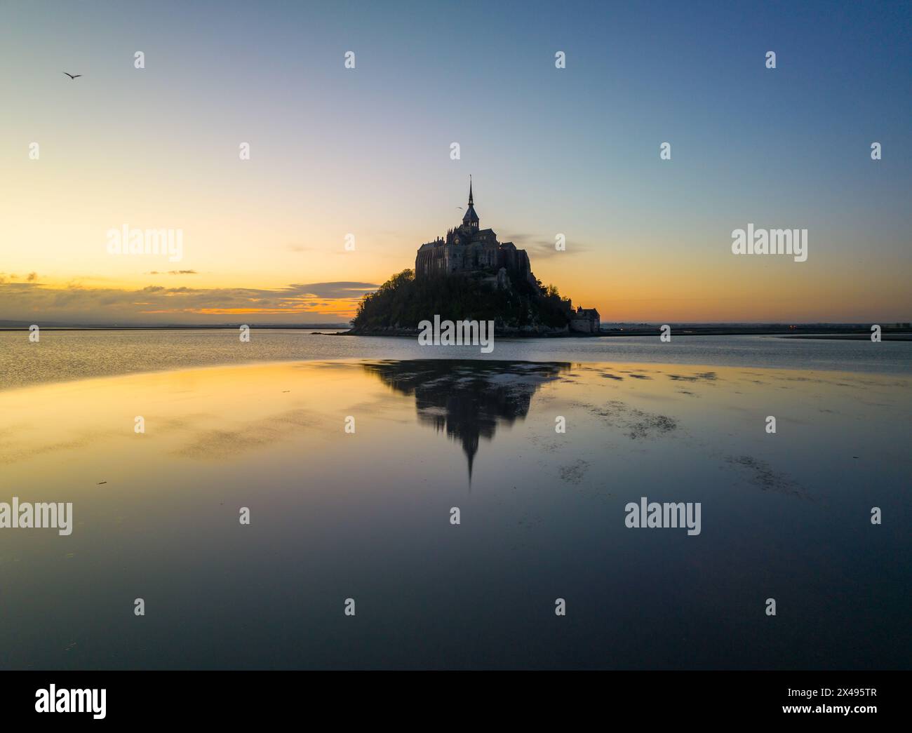 Aerial view of the famous French landmark Abbaye du Mont-Saint-Michel ...