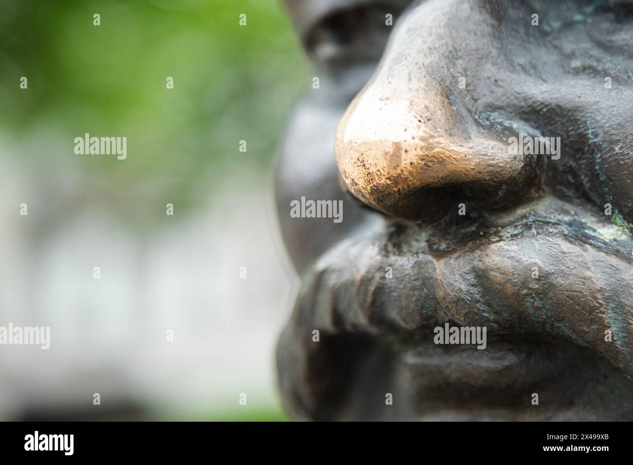Bronze sculpture with a polished nose. The nose is shiny from all the ...