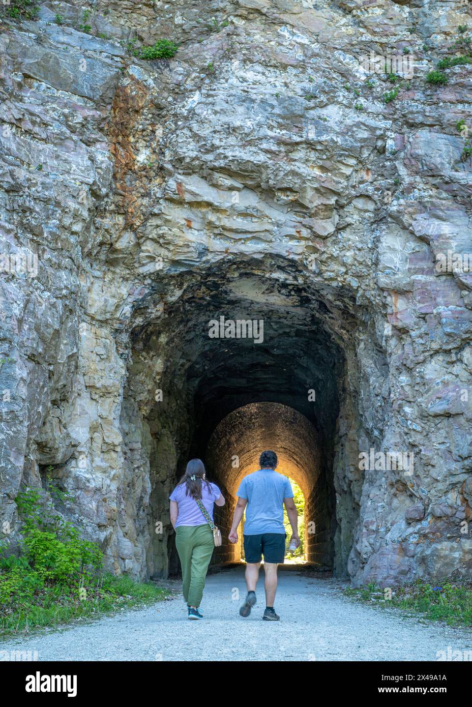 Rocheport, MO, USA - April 21, 2024: A couple is walking through MKT ...